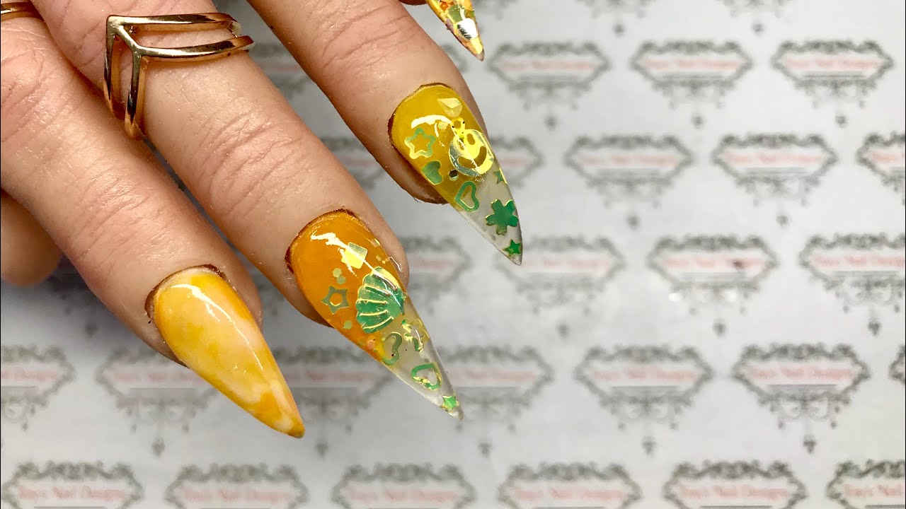 Marigold Yellow Acrylic Salon Design with Fun Glitter Pieces and Clear ...