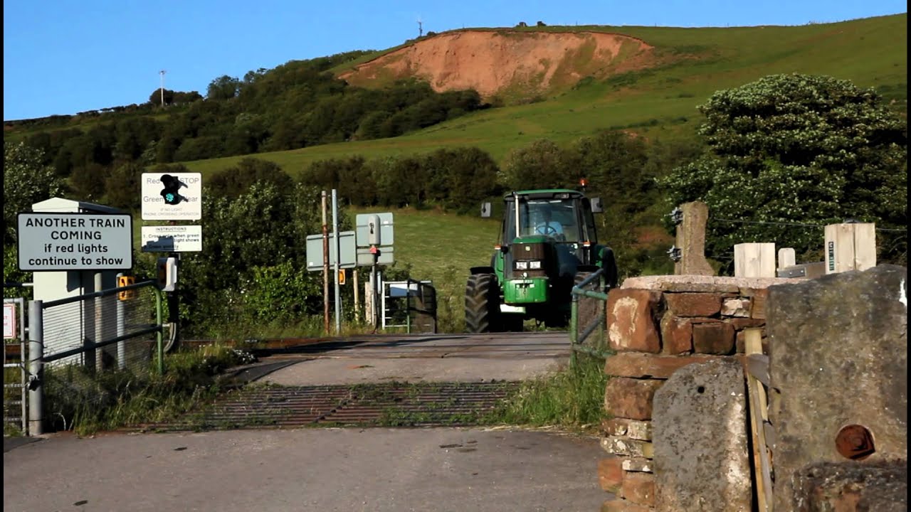 Train and Tractor at Park House Farm Level Crossing - YouTube