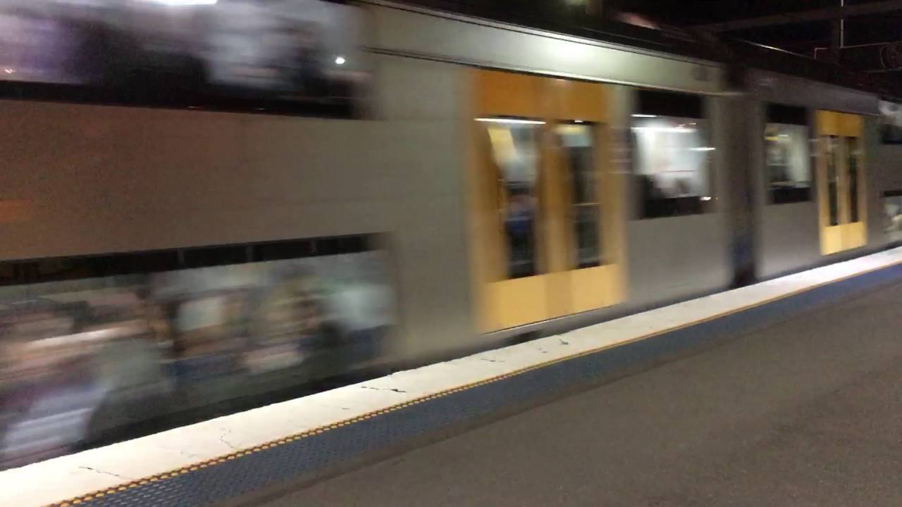 Train zooming past Lidcombe - YouTube