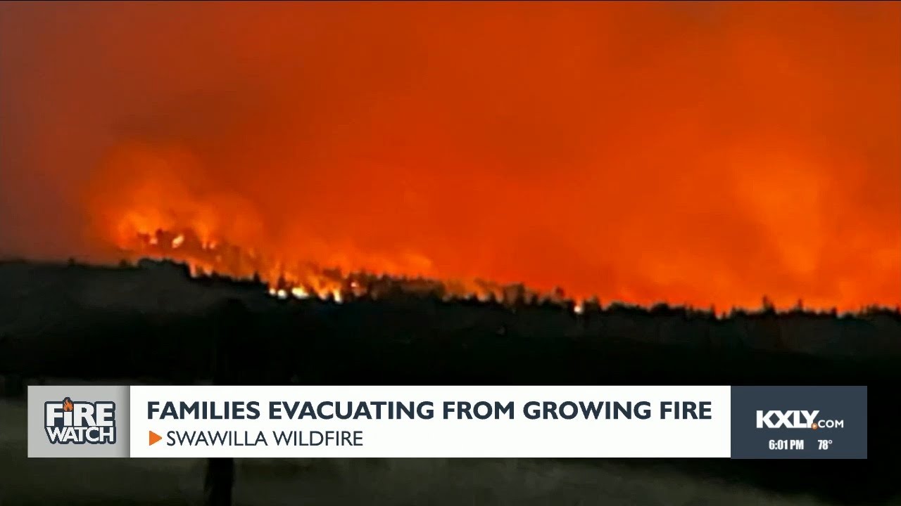 Families evacuating from growing Swawilla Fire - YouTube