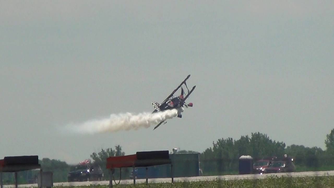 Prometheus biplane flies between 2 ribbons - YouTube