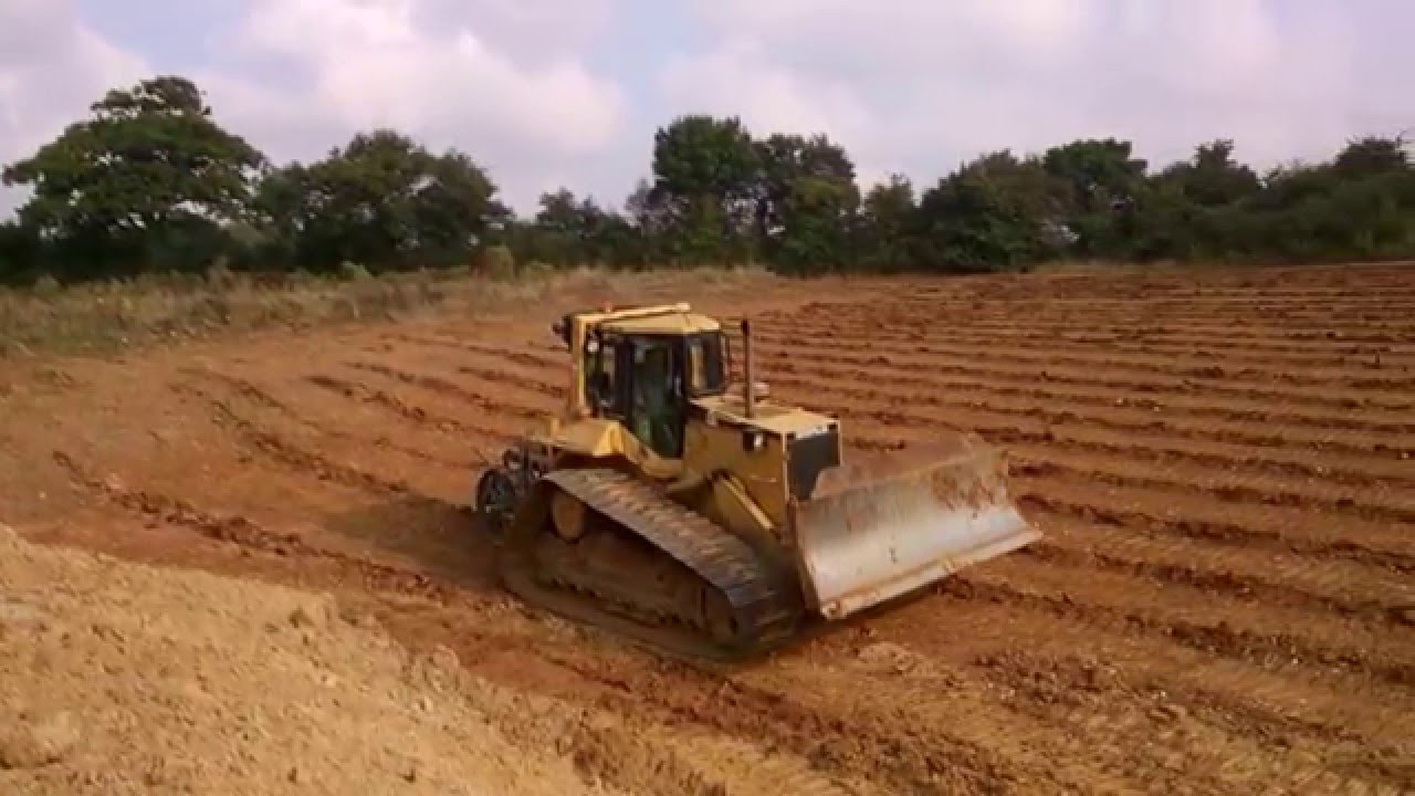 D6R HIGH TRACK DOZER PULLING A 1940 RIPPER - YouTube
