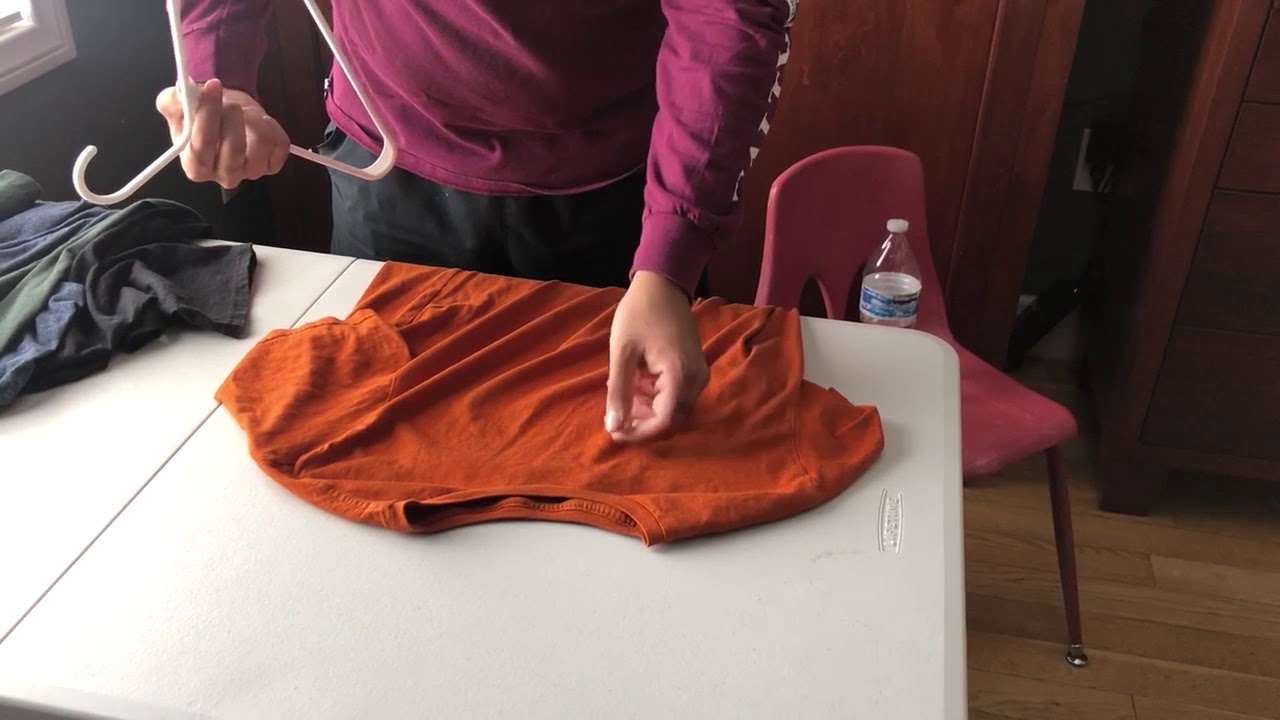 How to Put a Shirt on a Hanger - YouTube