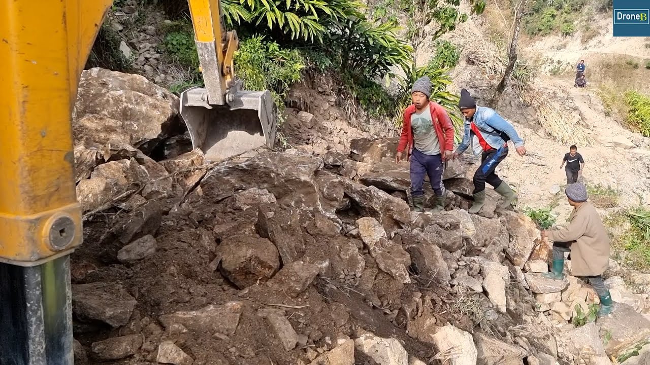 Mountain Rocky Road Fixing with JCB Backhoe - YouTube
