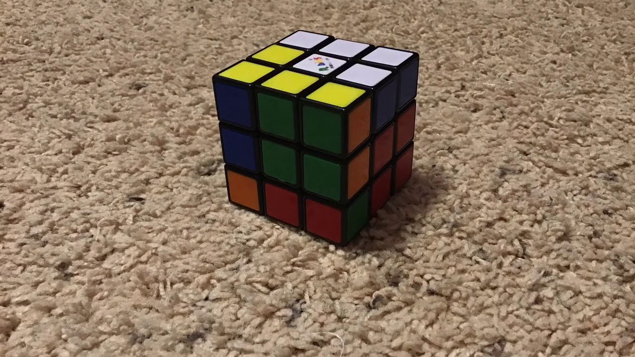 Rubik’s cube solving itself, slow and fast motion. - YouTube