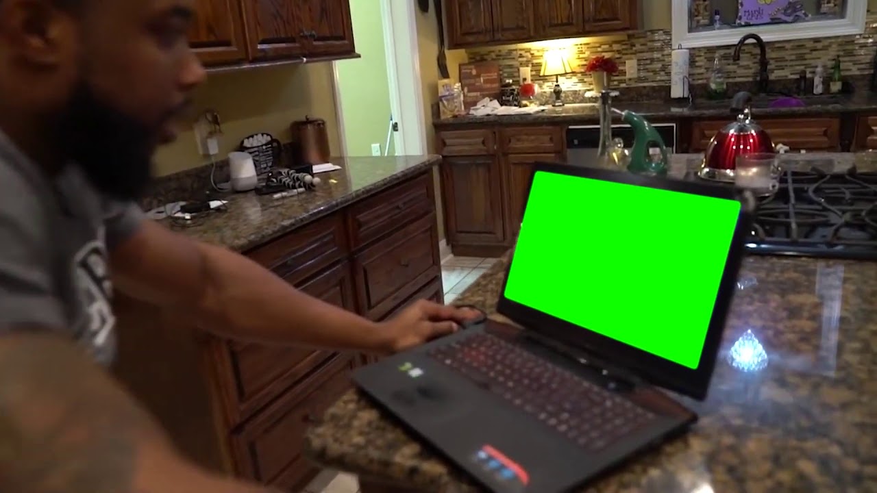 Black man punches the green screen laptop // grren screen effect ...