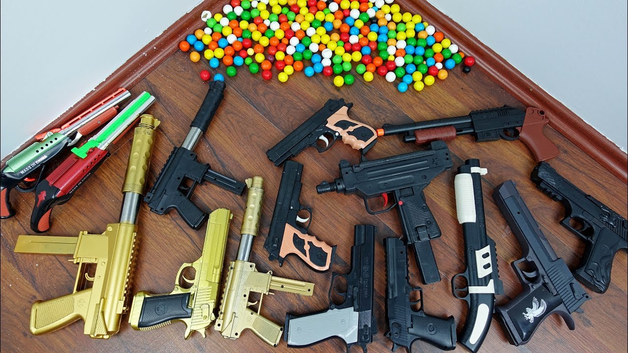 Toy Guns and Weapons - Fire with Target Candies - YouTube