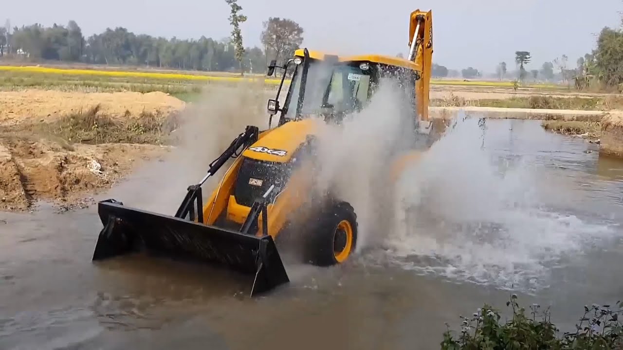 JCB Backhoe Washing in the River | RoadPlanet Captures JCB Backhoe Wash ...