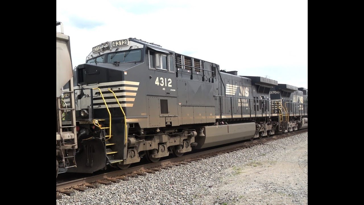 Norfolk Southern 3 engine train crosses switch. - YouTube