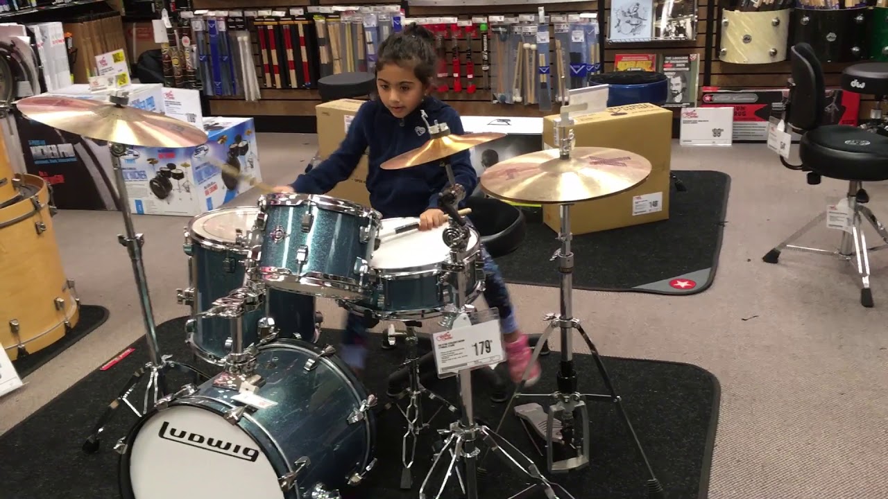 Lira playing Drums for the first time - YouTube