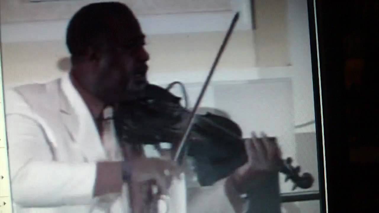 Samuel Murrell playing at a youth program - YouTube