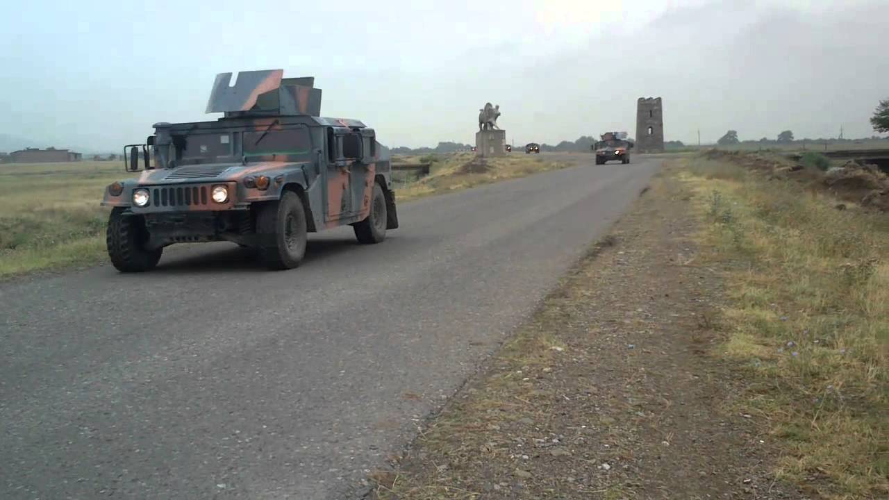 Column of Cougar (MRAP) and HUMVEE - YouTube