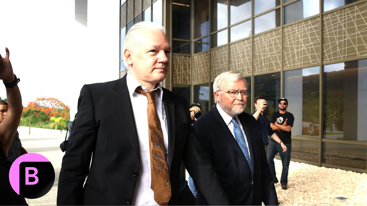Assange Arrives at US District Court in Saipan - YouTube