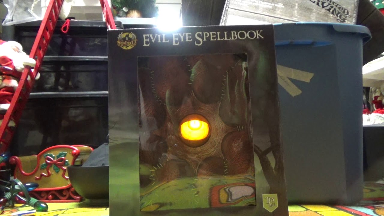 Spirit Halloween (YJ) Animated Evil Eye Spell Book - YouTube