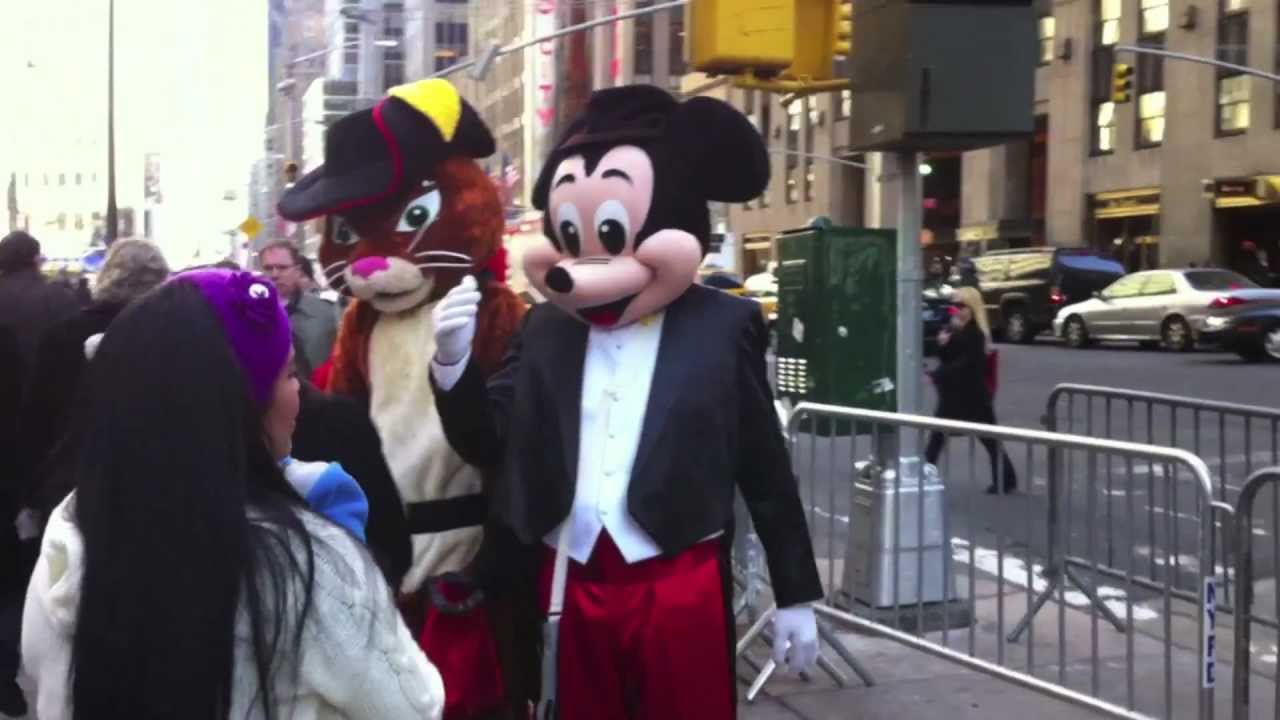 Crazy Times Square character curses guy out - YouTube