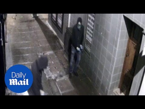 Armed robbers put masks on in full gaze of CCTV cameras - Daily Mail ...