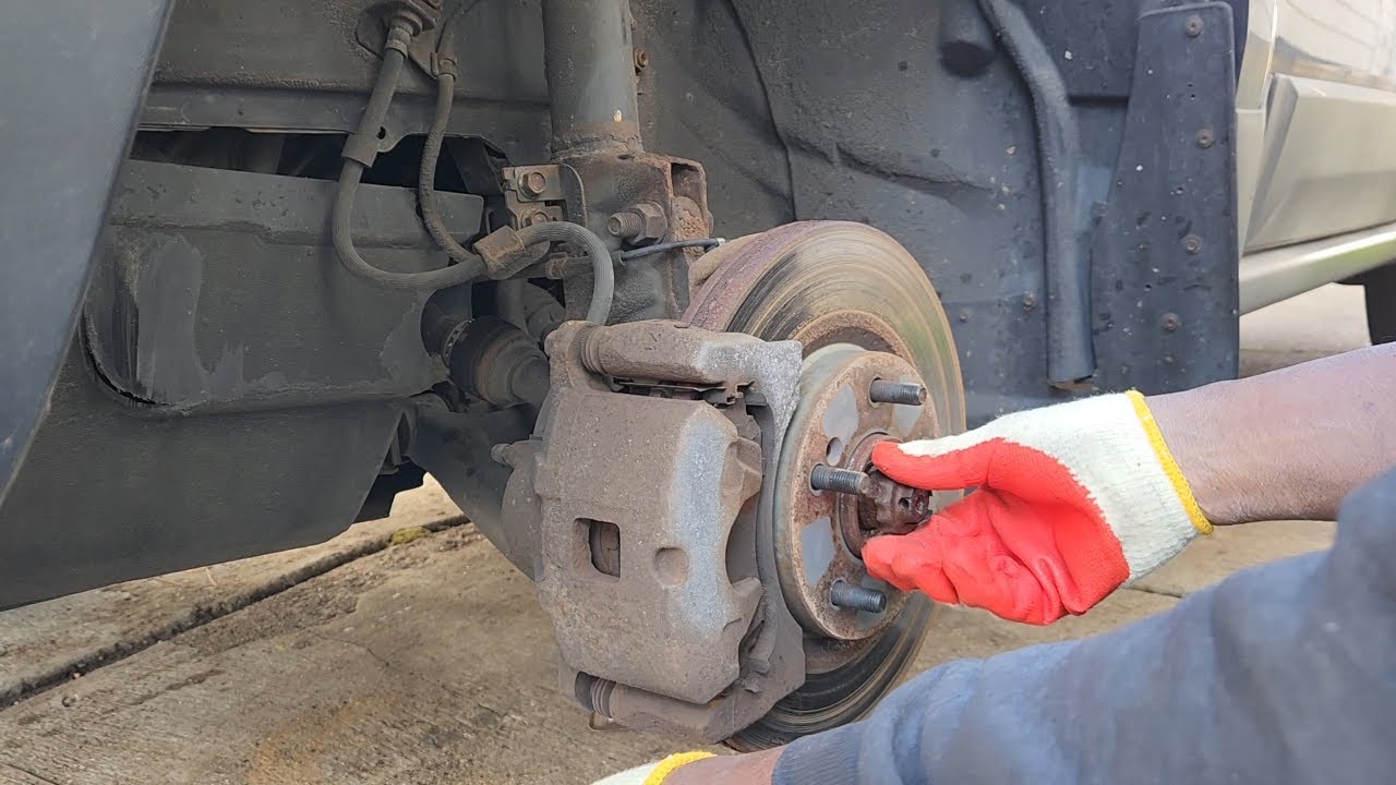 2011 Jeep Patriot front spindle job - YouTube