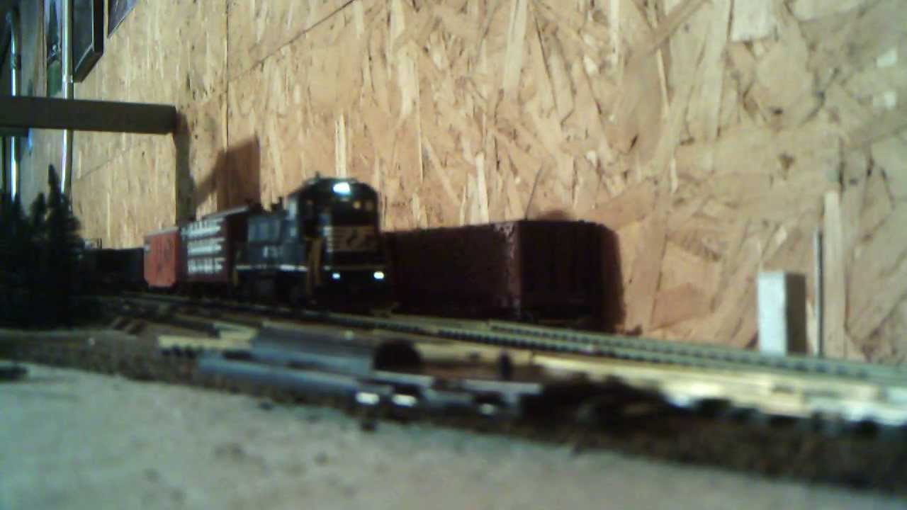 HO scale train by the detector - YouTube