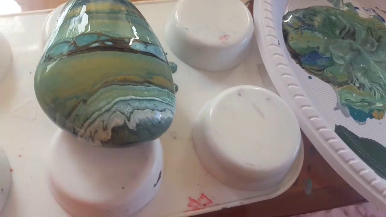 Acrylic pour on a garden rock and covered with resin. - YouTube