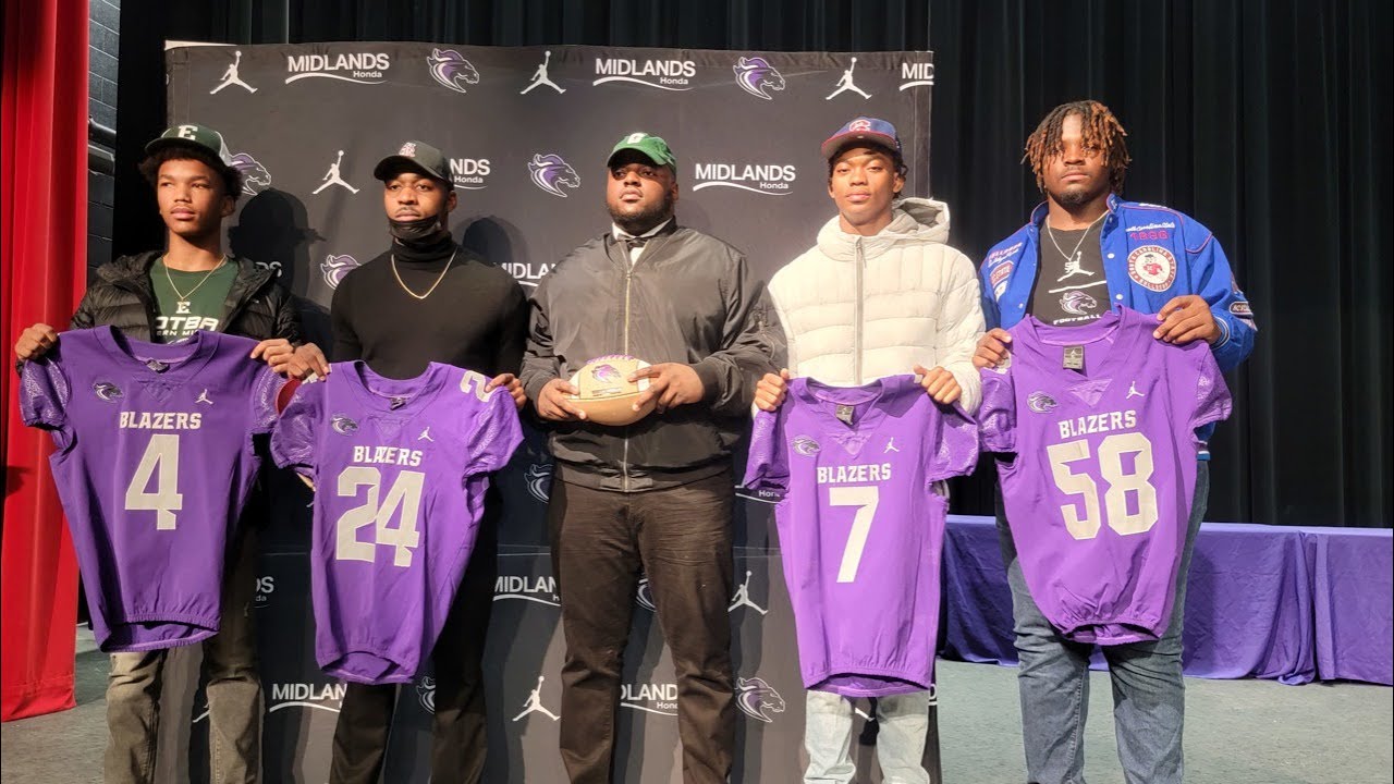 Watch: Ridge View football players sign with colleges - YouTube