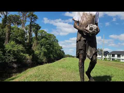 Athlete falls in mud