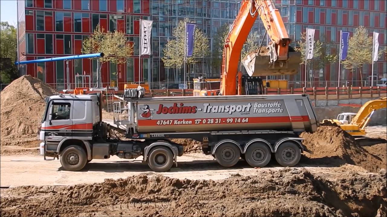 Bagger beladen LKW 130 in 15 Minuten mit Zeitraffer - YouTube
