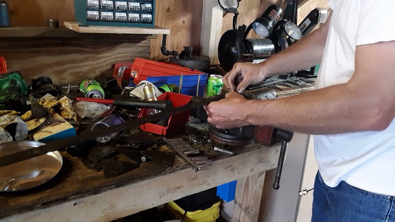 Sickle Bar section removal and adding sections with rivets and hammer ...