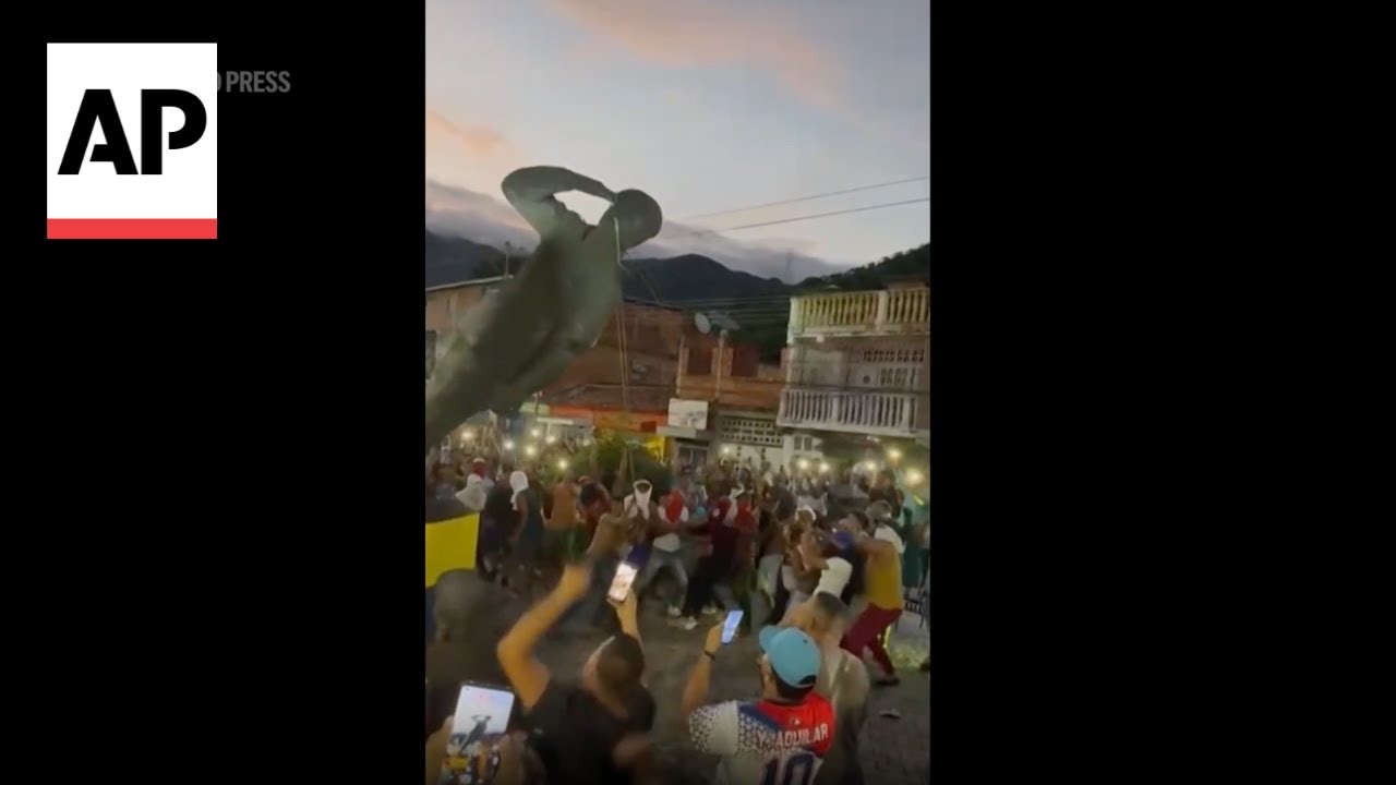WATCH: Protesters take down statues of Hugo Chavez in Venezuela - YouTube