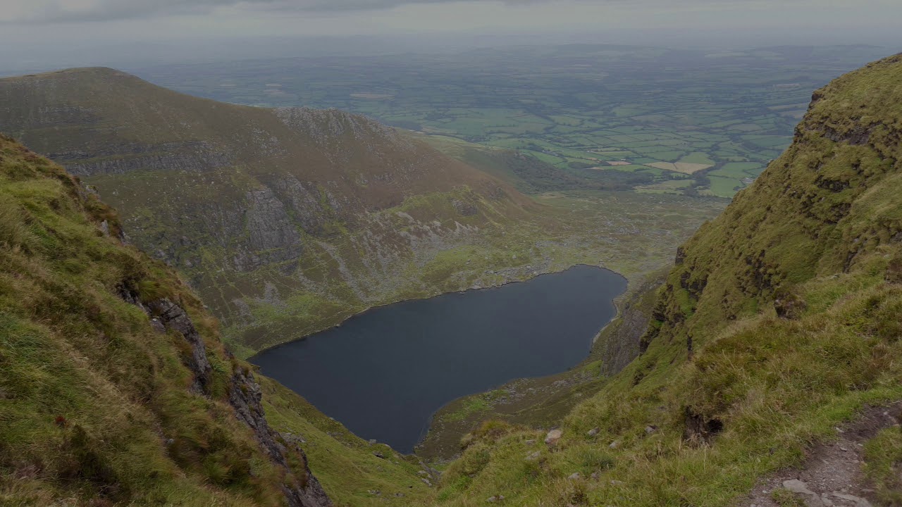 Over Coumshingaun lake on the Comeragh mountains Ireland - YouTube