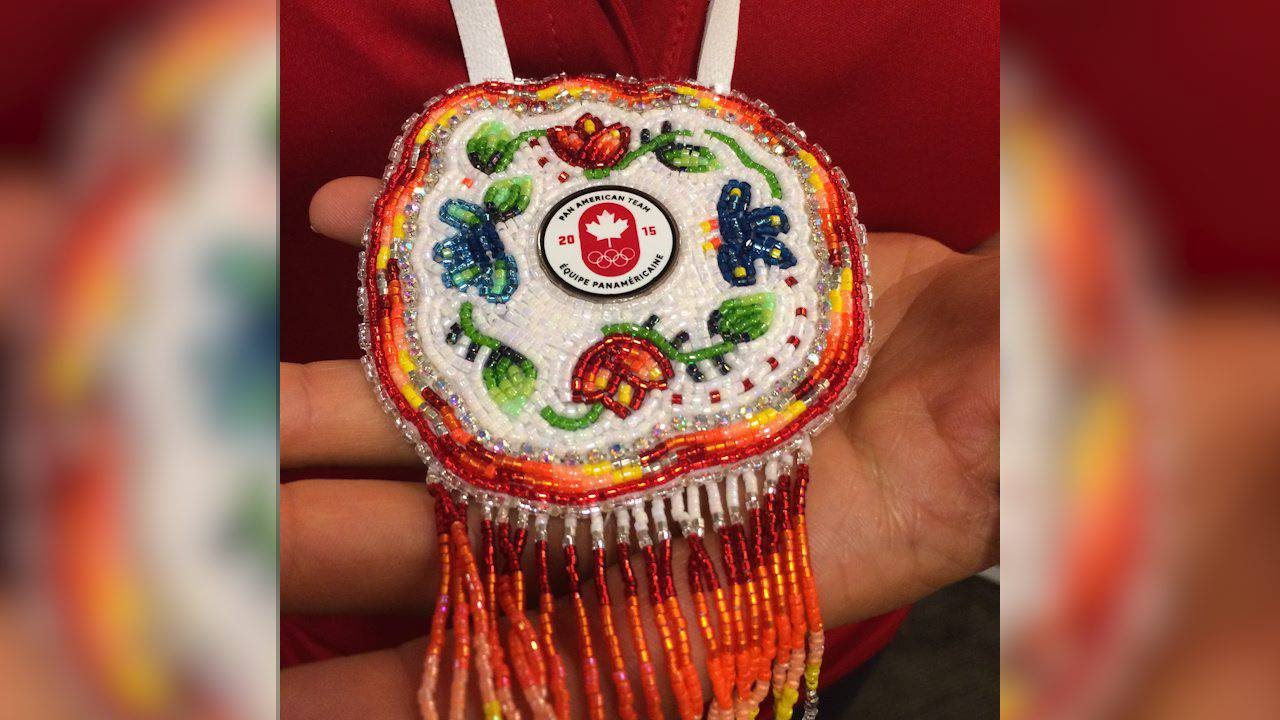 Olympian incorporates First Nations culture into Pan Am jewelry - YouTube