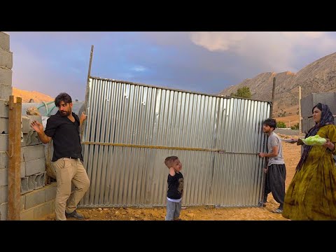 Building a yard door with the help of Ishaq and Amir