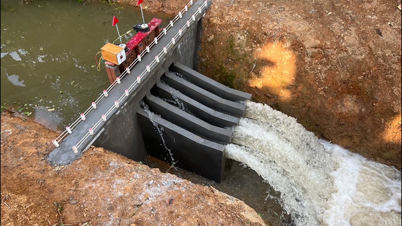 Construction of mini dams to store water and release floodwaters when ...