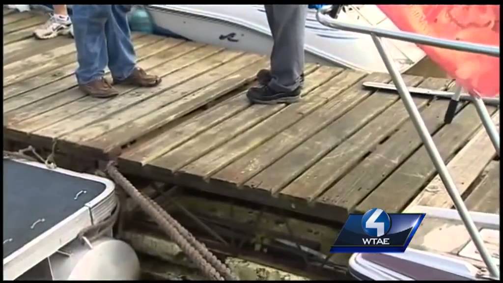 Towboat stops runaway dock, boats on Mon River - YouTube