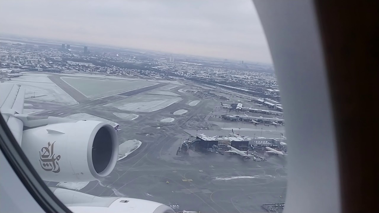 Emirates Airbus A380 at snowy CPH airport - powerful takeoff runway 04R ...