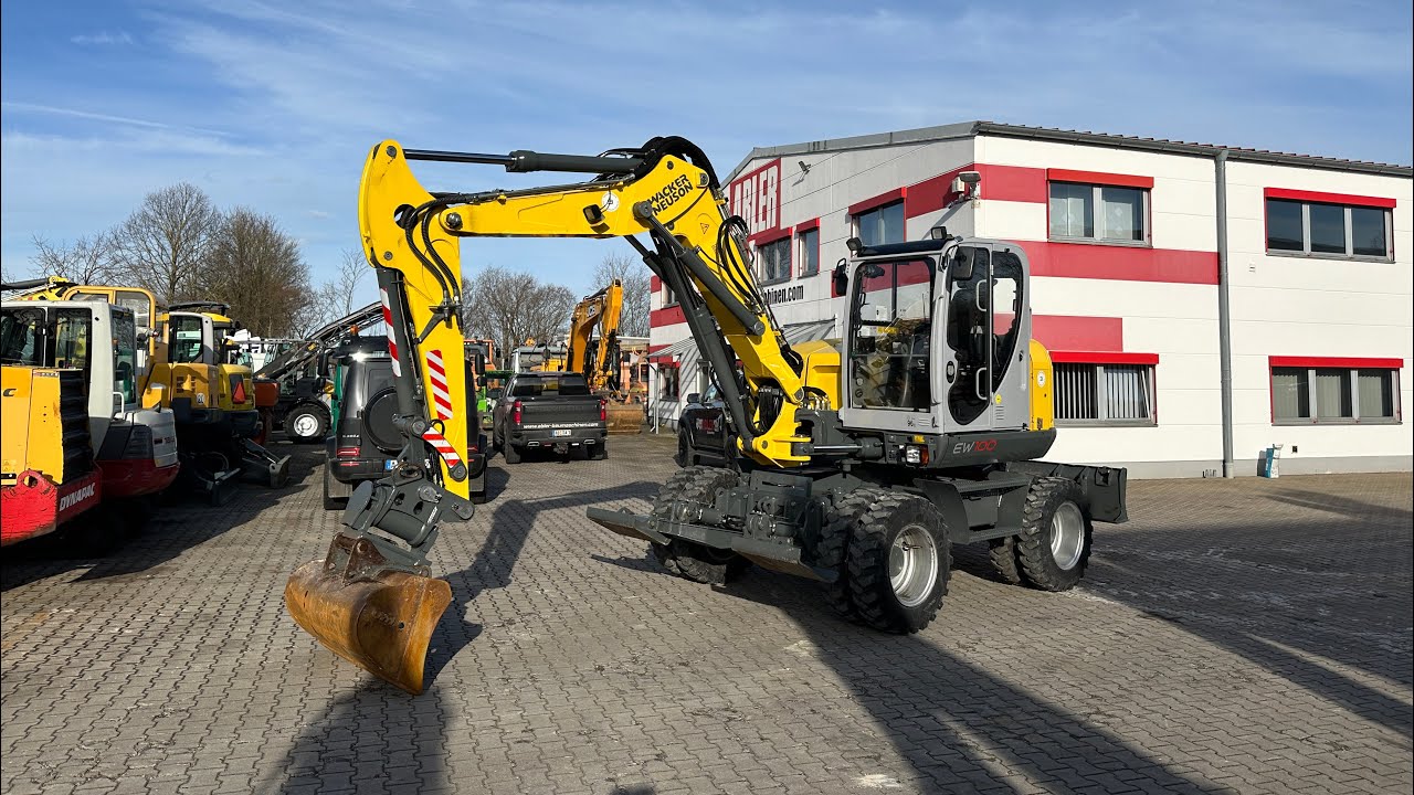 Wacker Neuson EW100 Mobilbagger Powertilt - YouTube