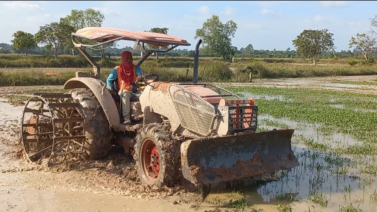 Two Kubota Working Hard Split Soil Paddy Field, Kubota Harrow Soil ...