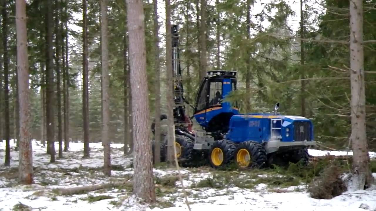 Rottne H11 harvester SP451LF head - YouTube