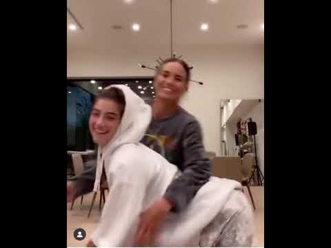 Charli D’Amelio throwing it back in front of her mom