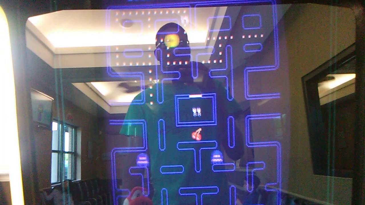 Red Yoshi playing the PAC Man game - YouTube