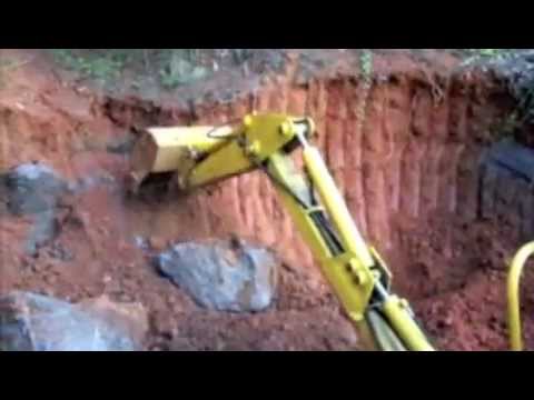 Working the Terramite with a 24" bucket - YouTube