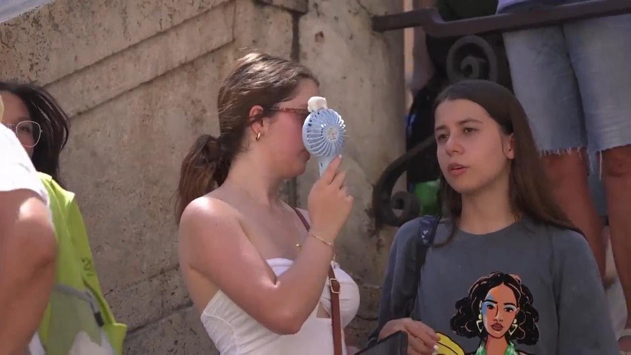 A heat wave hit Italy this weekend with many cities on red alert - YouTube