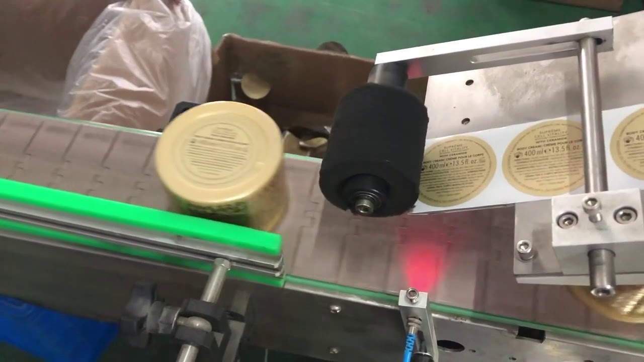 Automatic Orientation Wrap Around Labeling Machine - YouTube