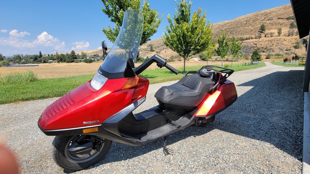 Honda Helix Scooter cn250 Rear Wheel Removal - YouTube