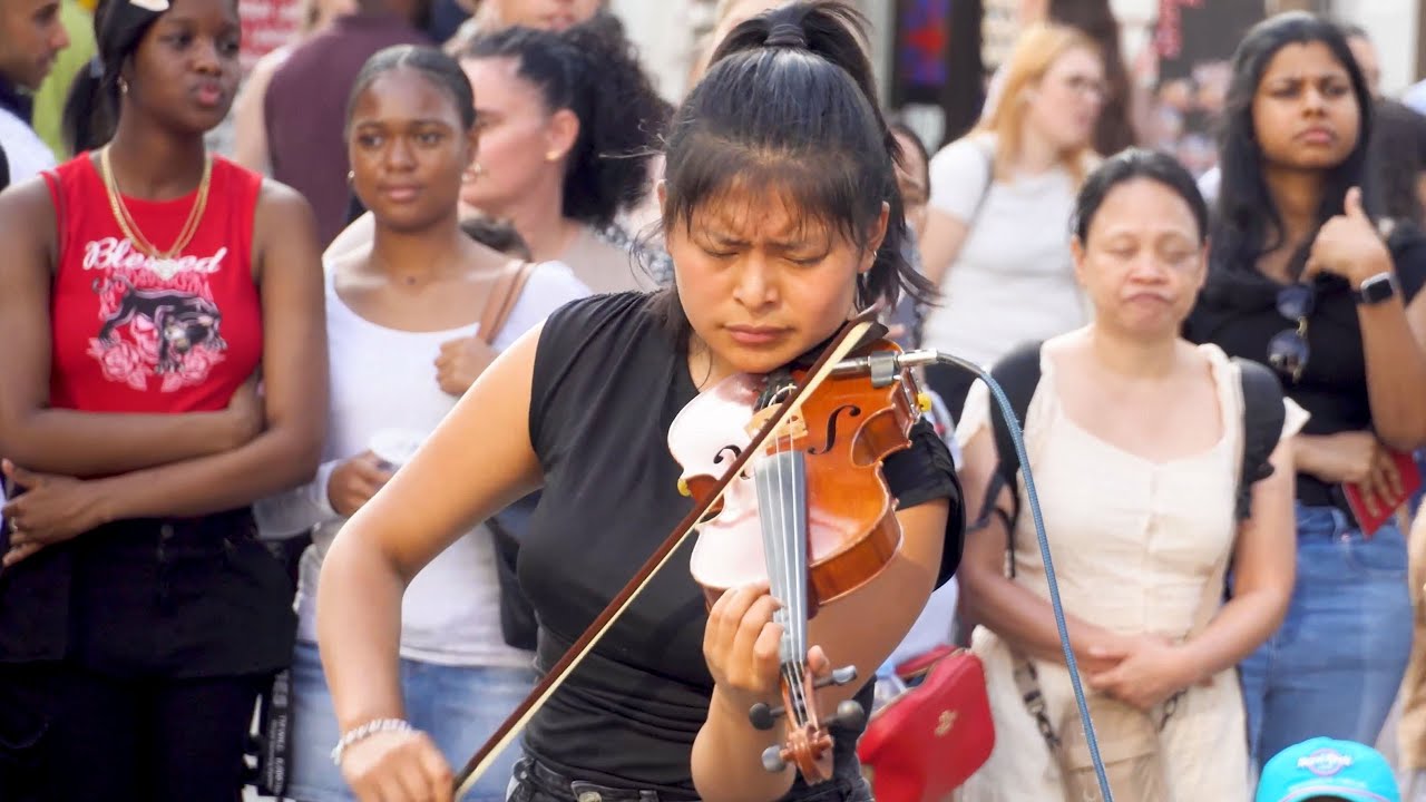 Ed Sheeran 'Shape of You' by Sara Maldonado in Leicester Square, London ...