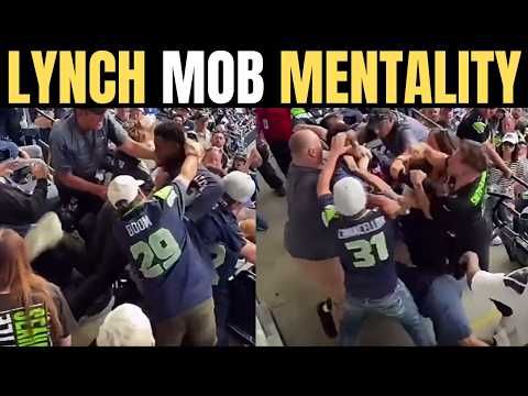 Black Man JUMPED By A MOB of White Thugs At Seahawks Game!!