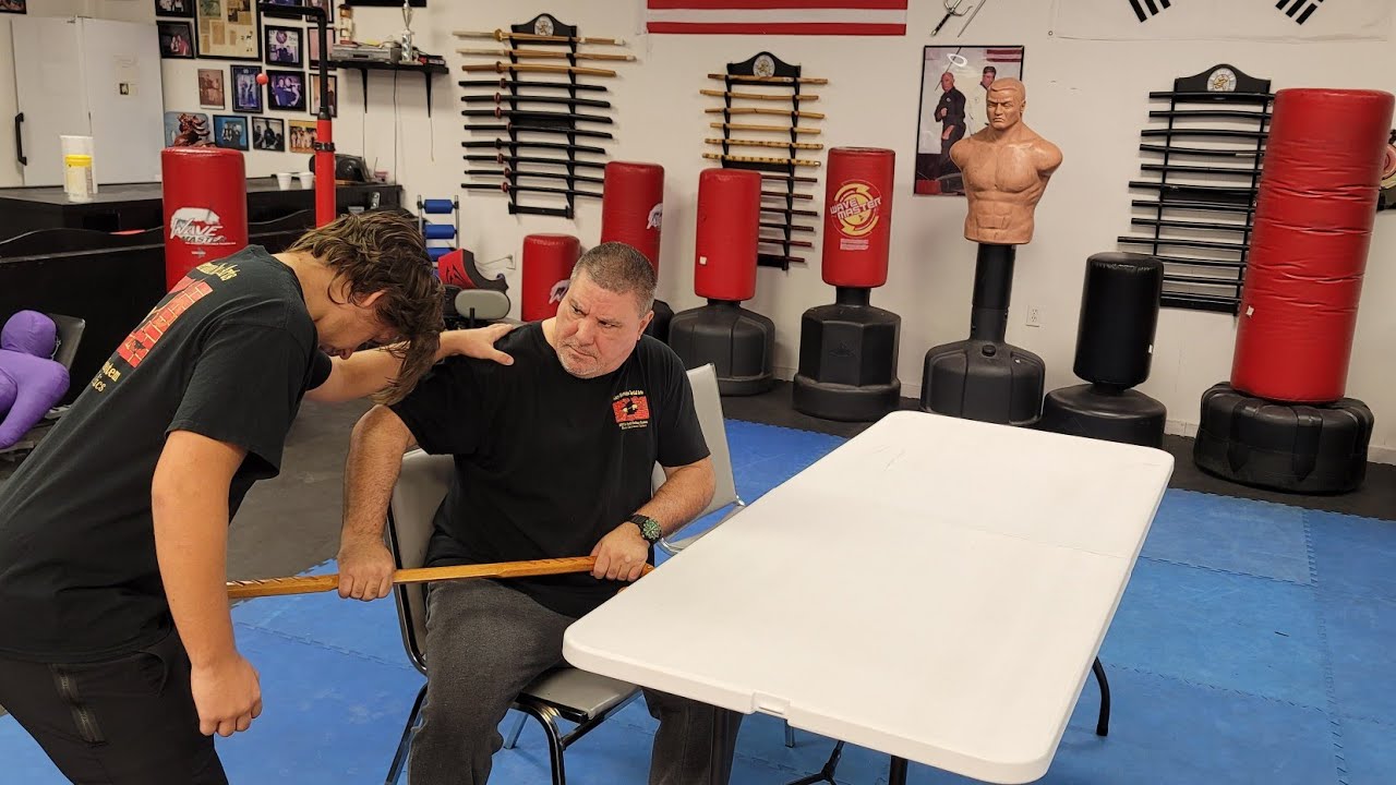 Cane Self Defense with sitting at a table and having an attacker at ...