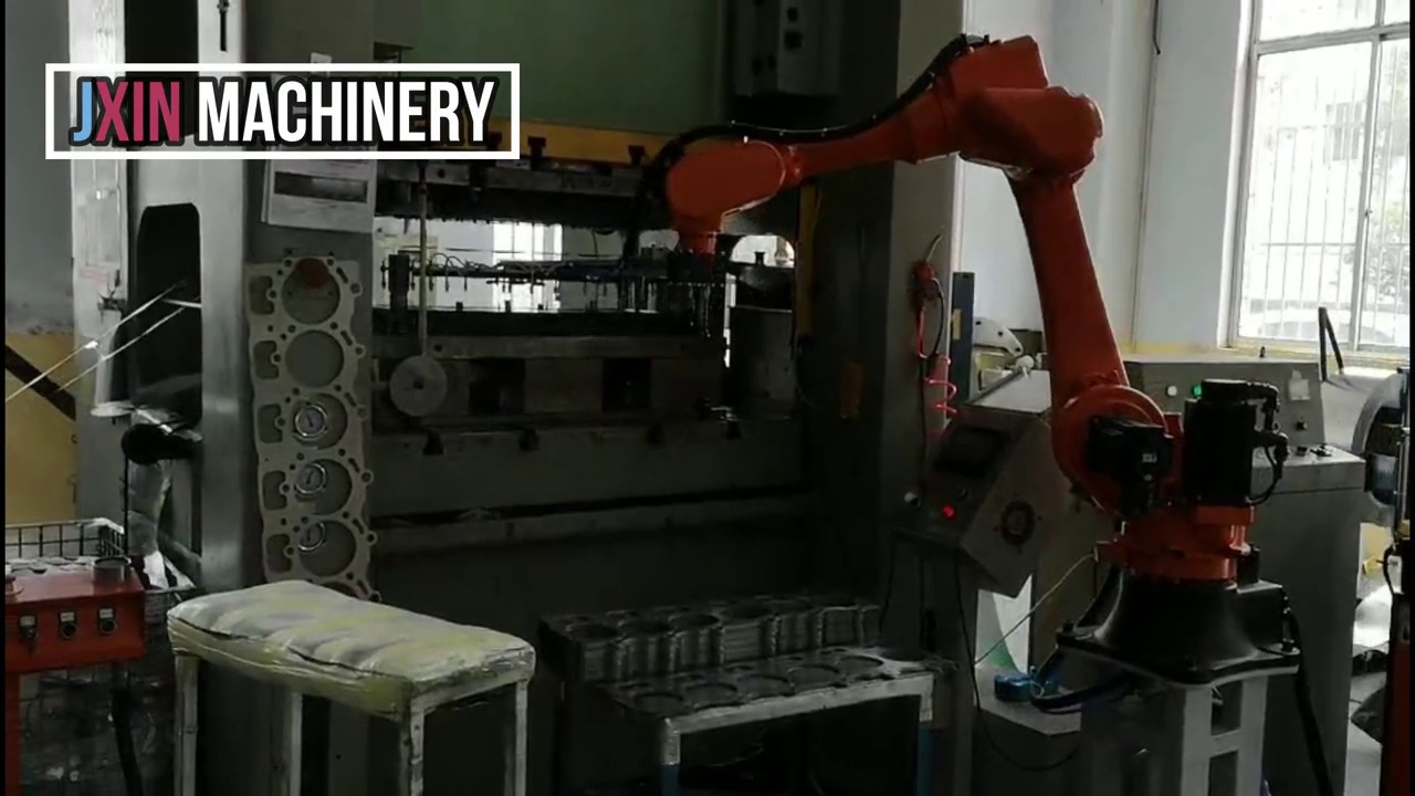 FEEDING AND FETCHING ROBOT IN CYLINDER HEAD GASKET INDUSTRY - YouTube