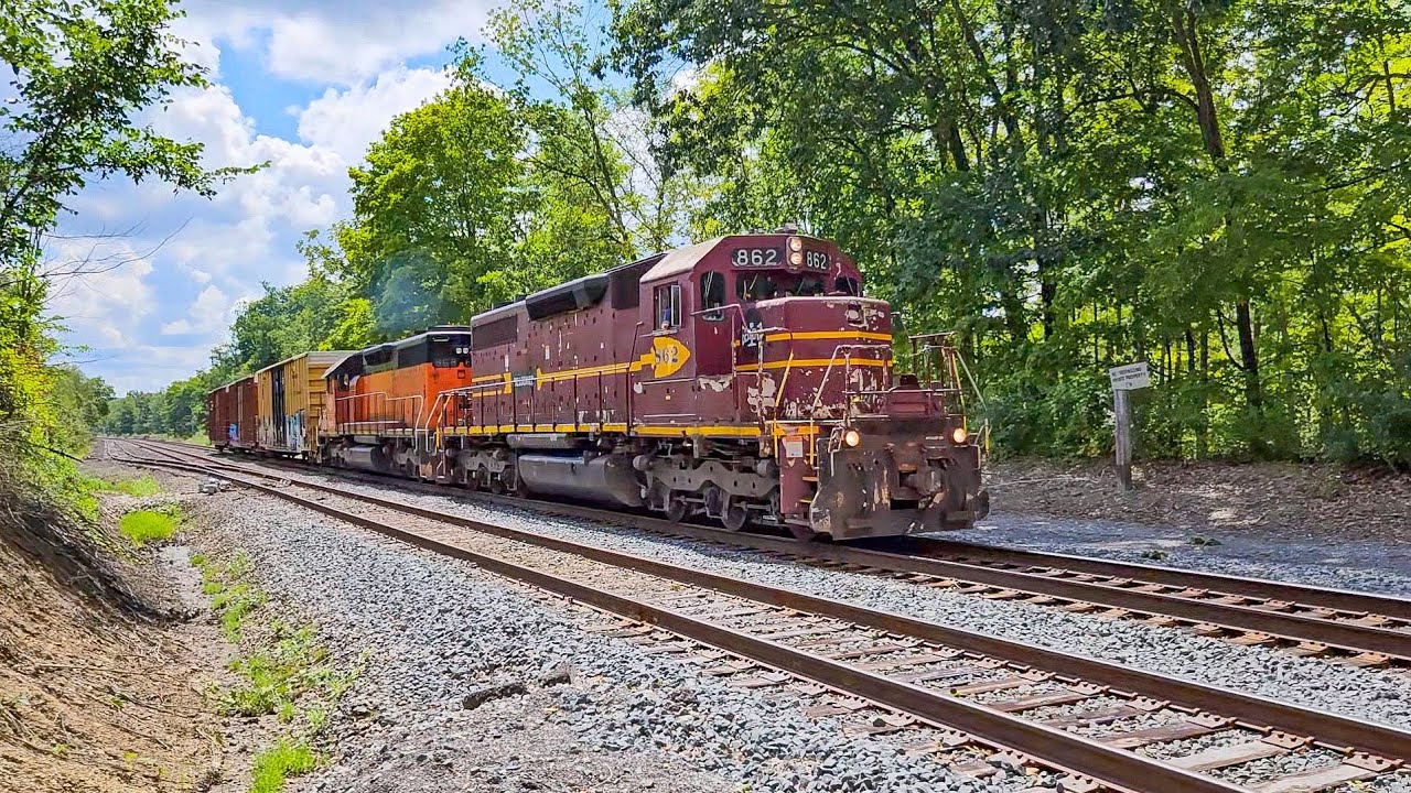 A pair of EMD SD38s throttle up through western Pennsylvania - YouTube