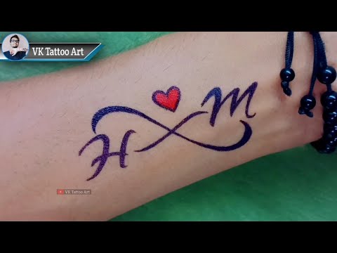 HM couple letter tattoo | tattoo of H M letter tattoo | H and M letter ...