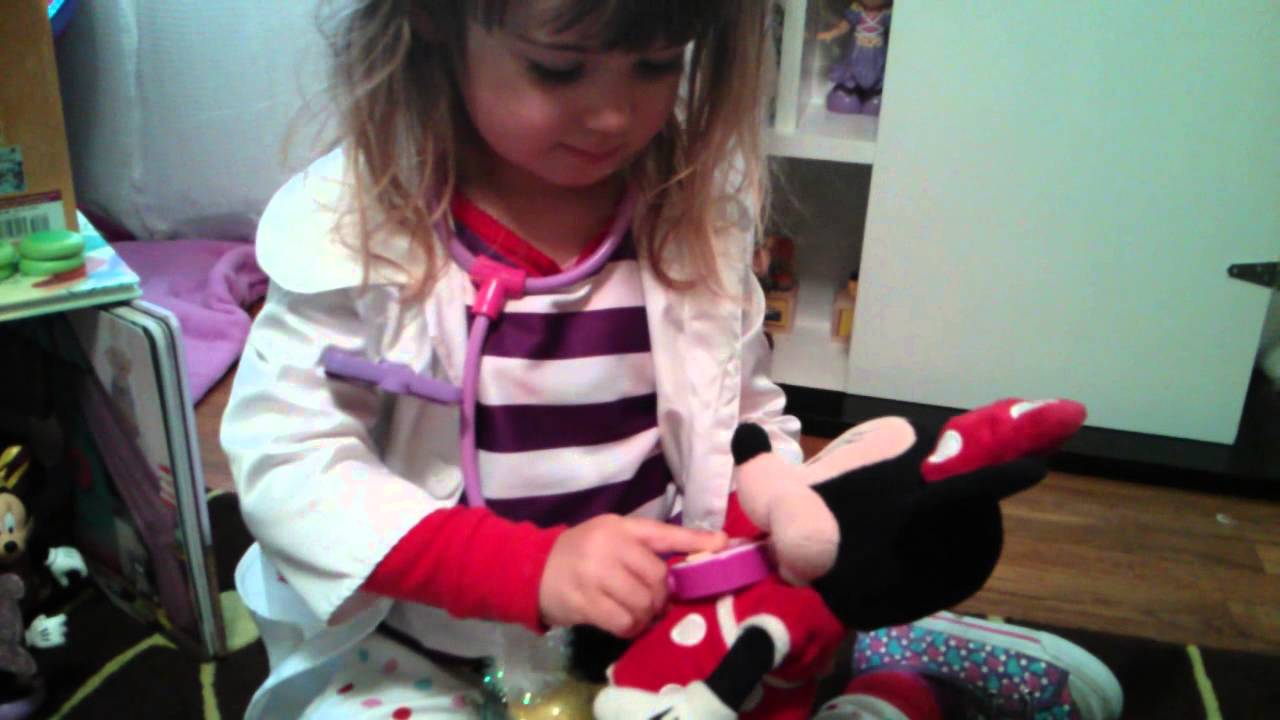 Little doctor doing a checkup on Minnie Mouse (Doc McStuffins style ...